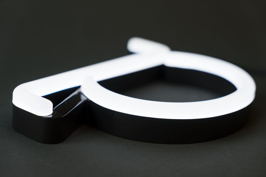 Real Neon vs Neon Effect: Which is Better for Your Signage?
